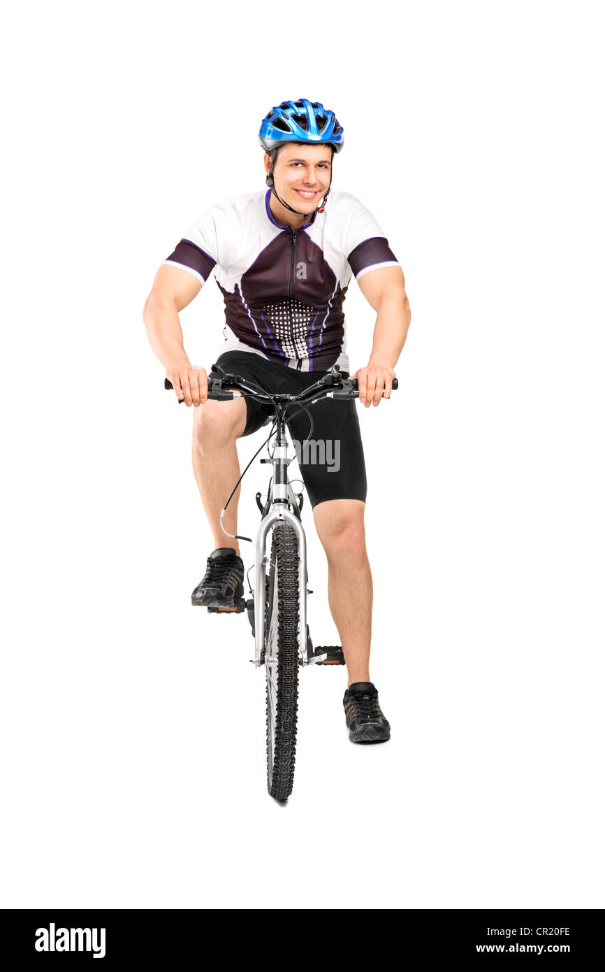 Full length portrait of a male bicyclist posing on a bicycle isolated ...