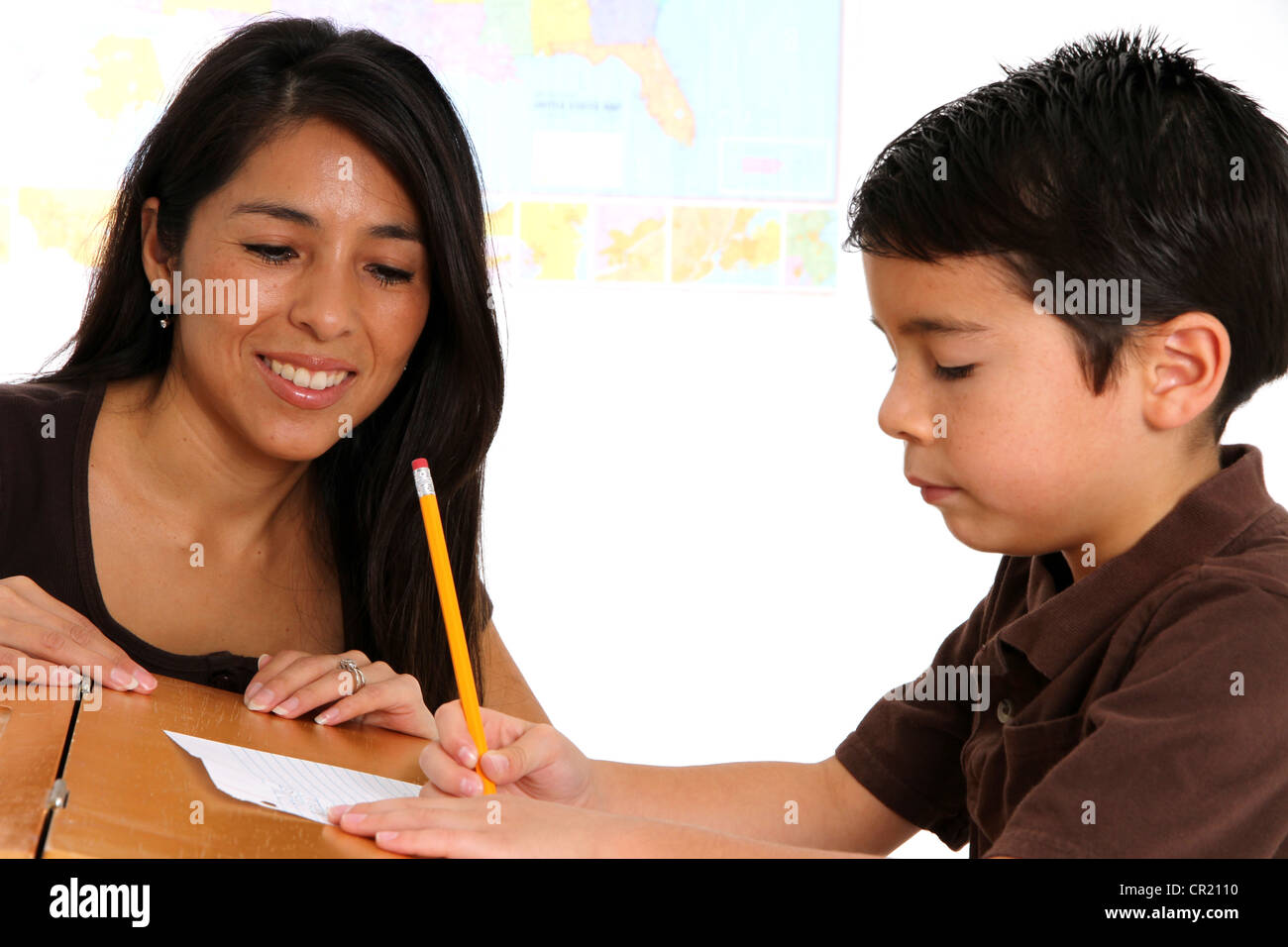 Elementary aged boy with teacher set on a white background Stock Photo ...
