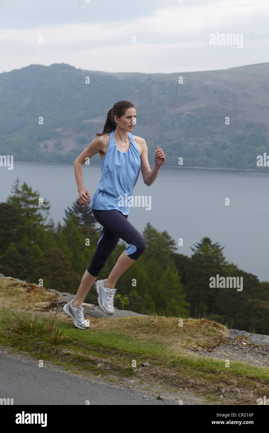 Running on hill hi-res stock photography and images - Alamy