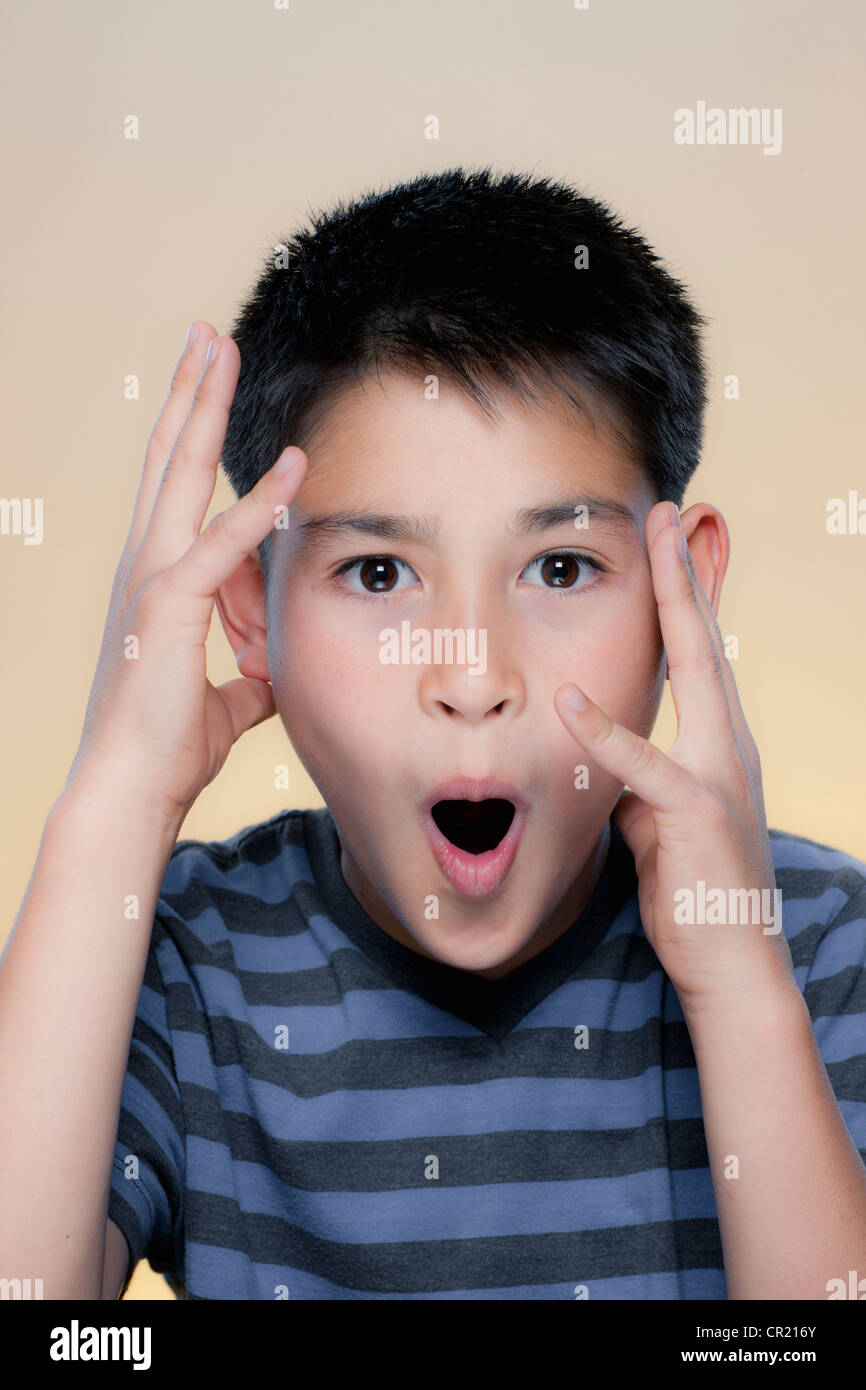Portrait of boy making facial expression Stock Photo - Alamy