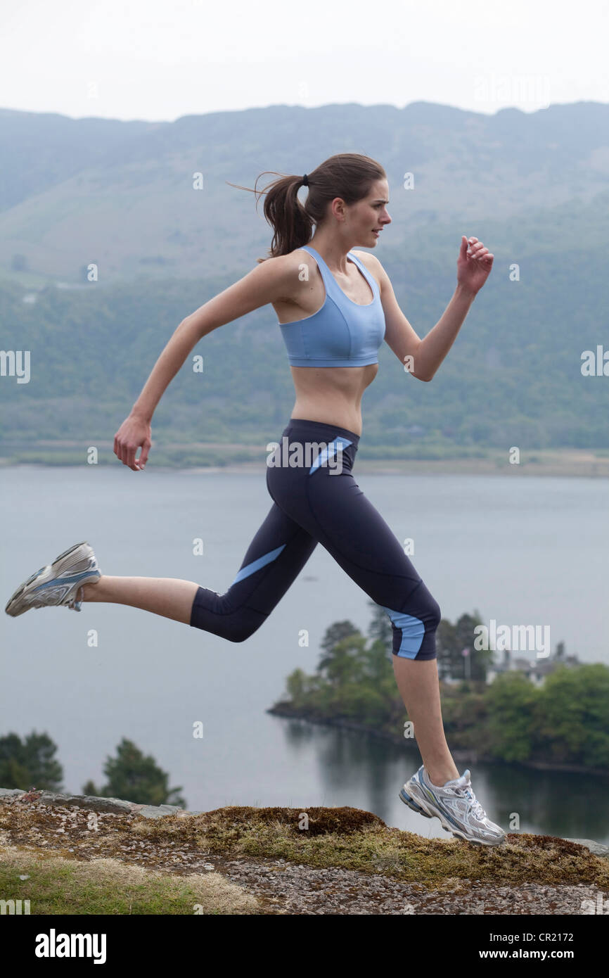 Running on hill hi-res stock photography and images - Alamy