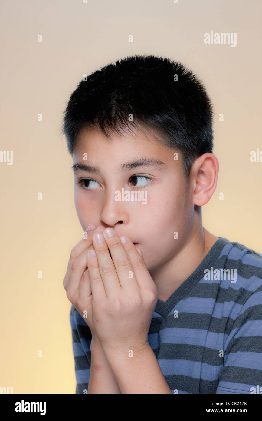 Portrait of scared boy Stock Photo - Alamy