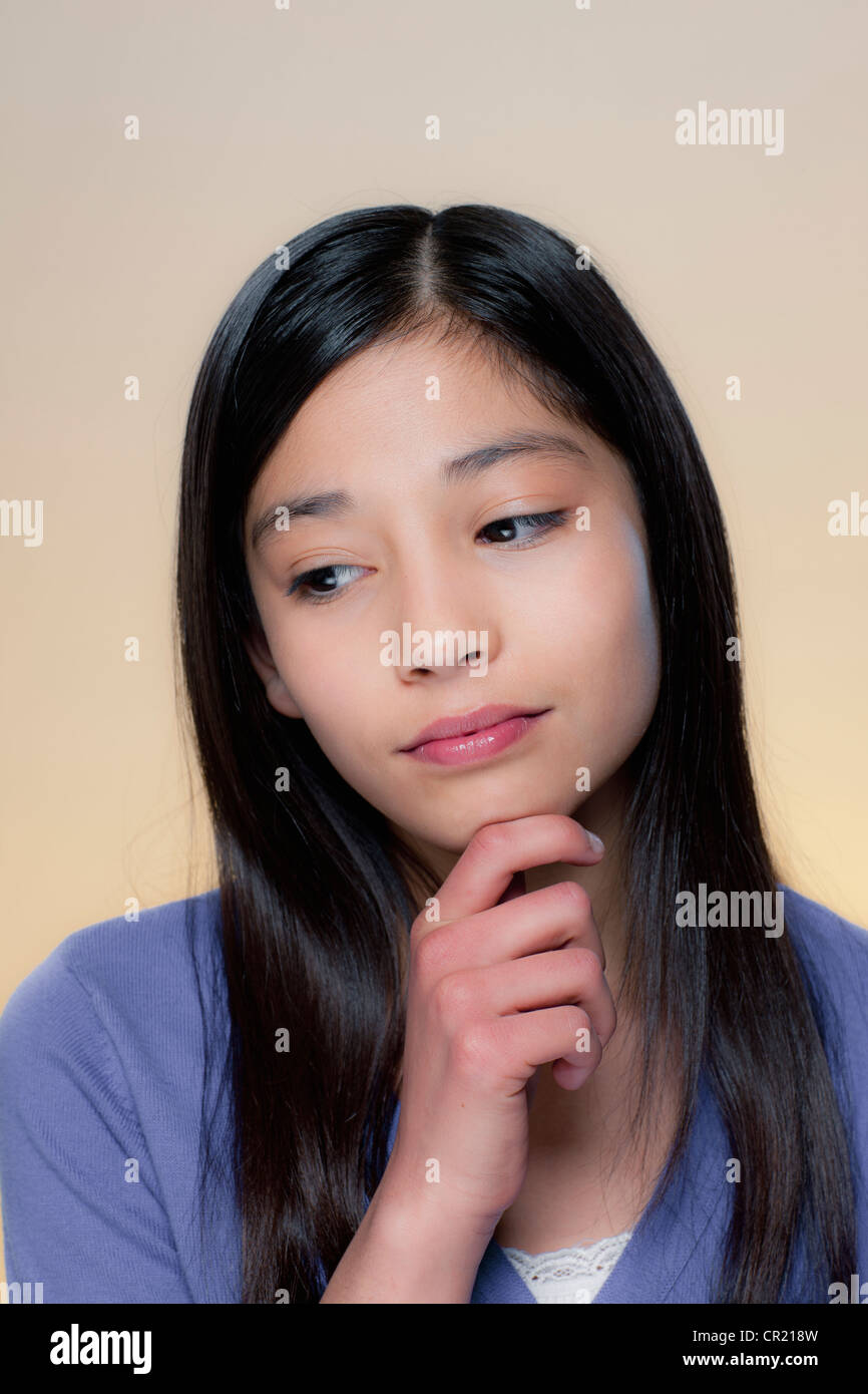 Portrait of girl with sad face Stock Photo - Alamy