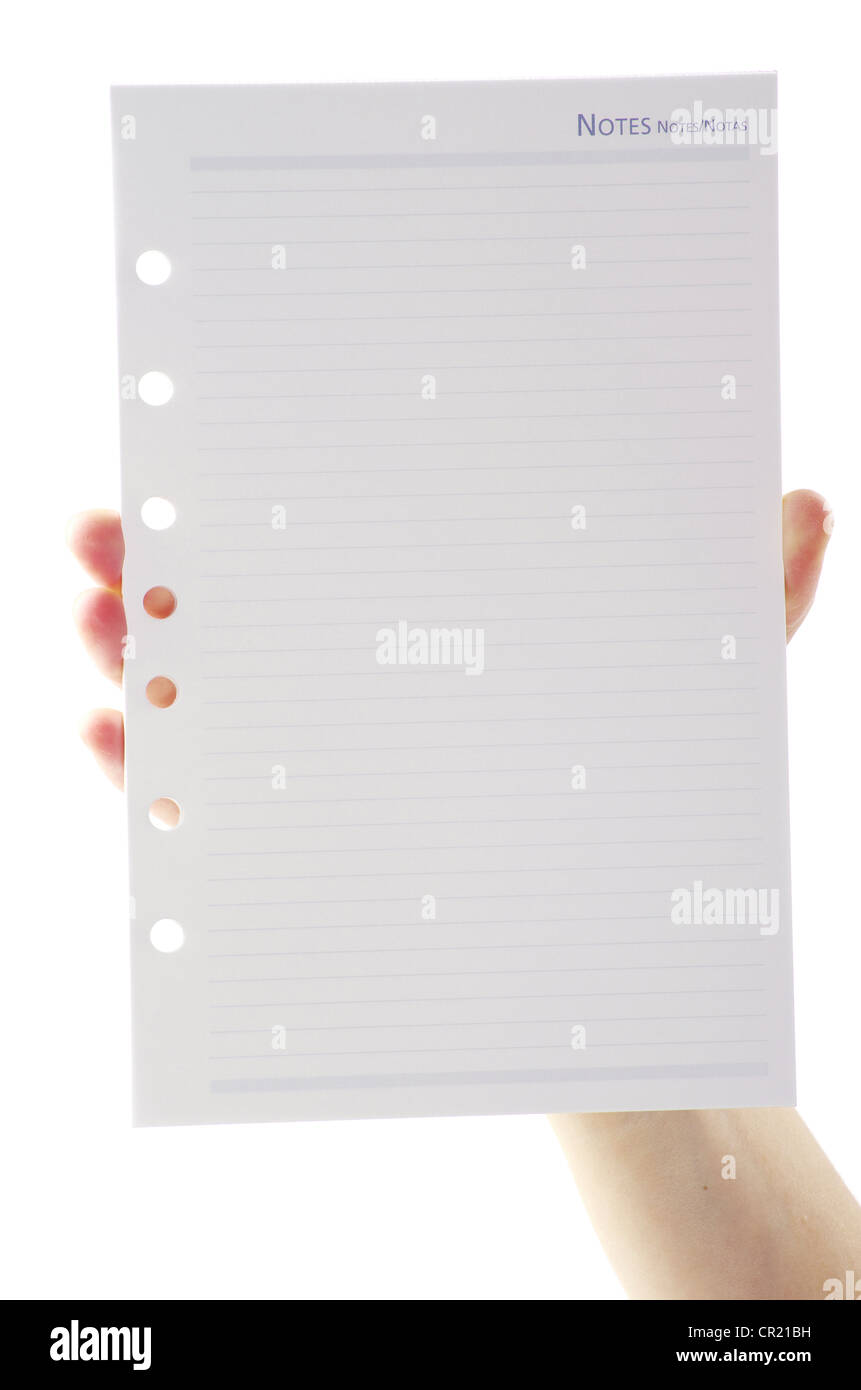 Page of block notes in hand isolated in white Stock Photo - Alamy