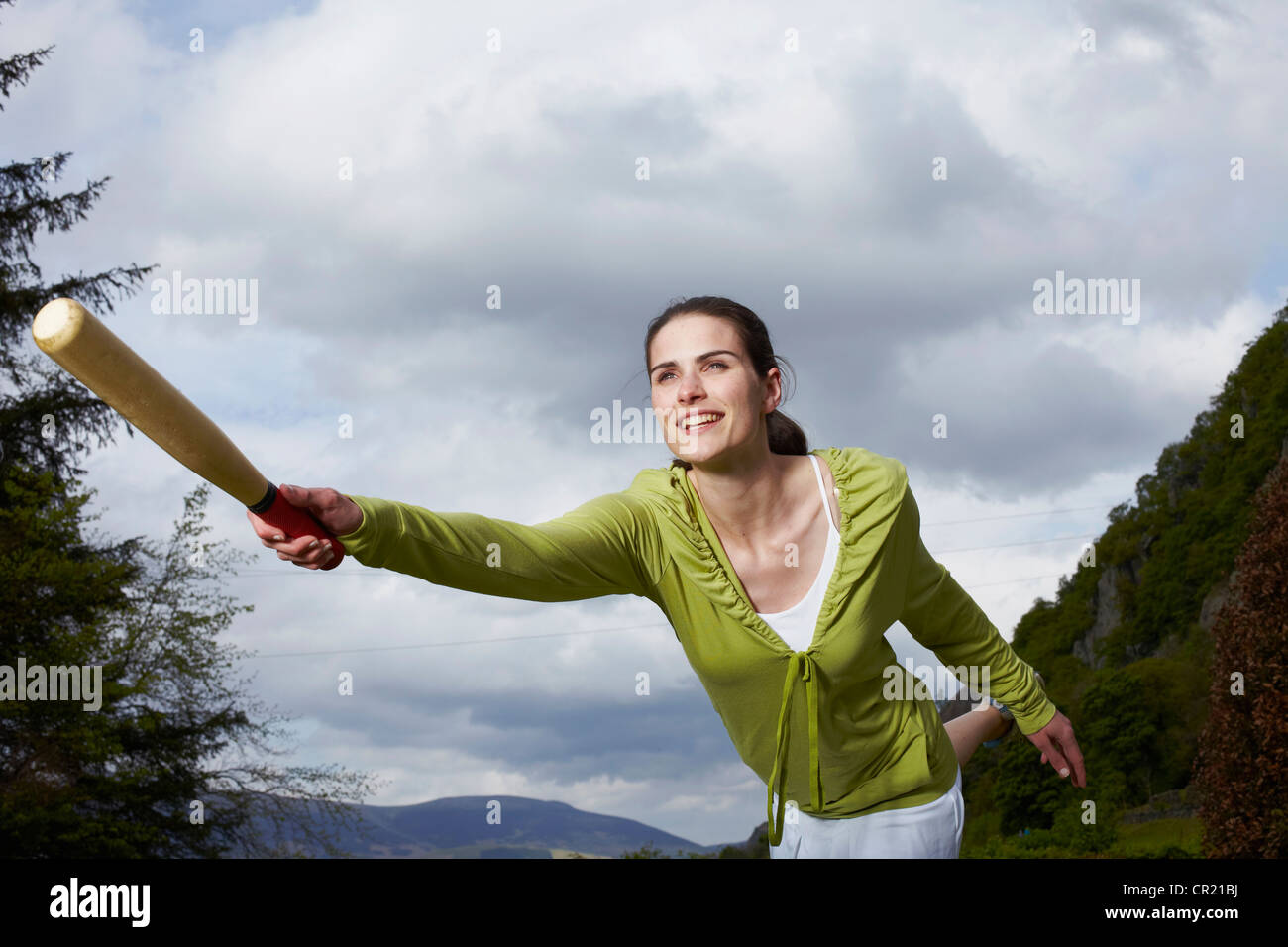 Happy young woman baseball bat hi-res stock photography and images - Alamy