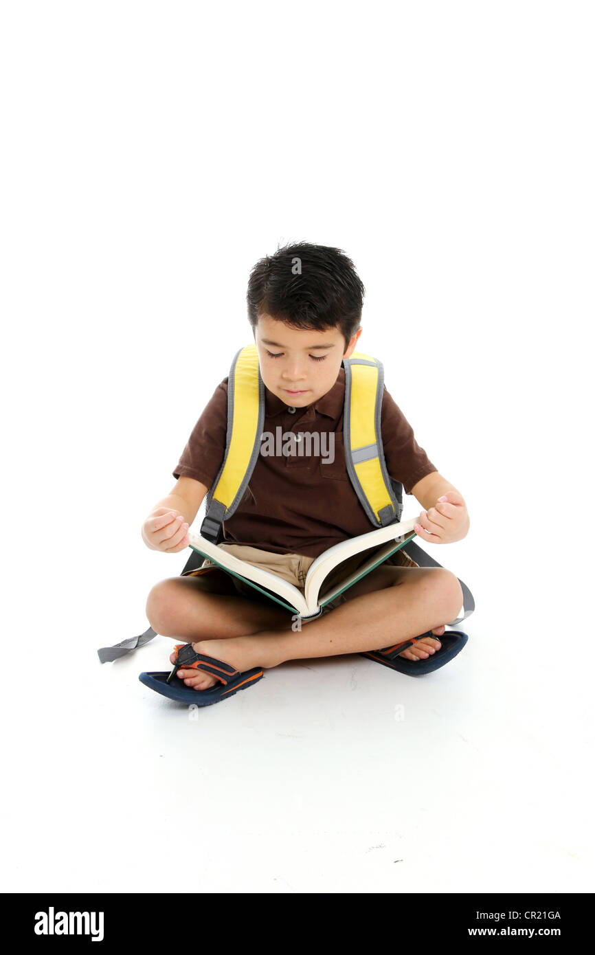 Young Boy Reading a Book on White Background Stock Photo - Alamy