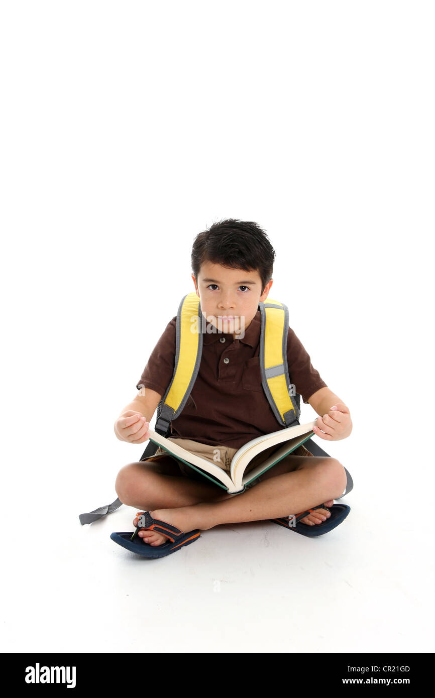 Young Boy Reading a Book on White Background Stock Photo - Alamy