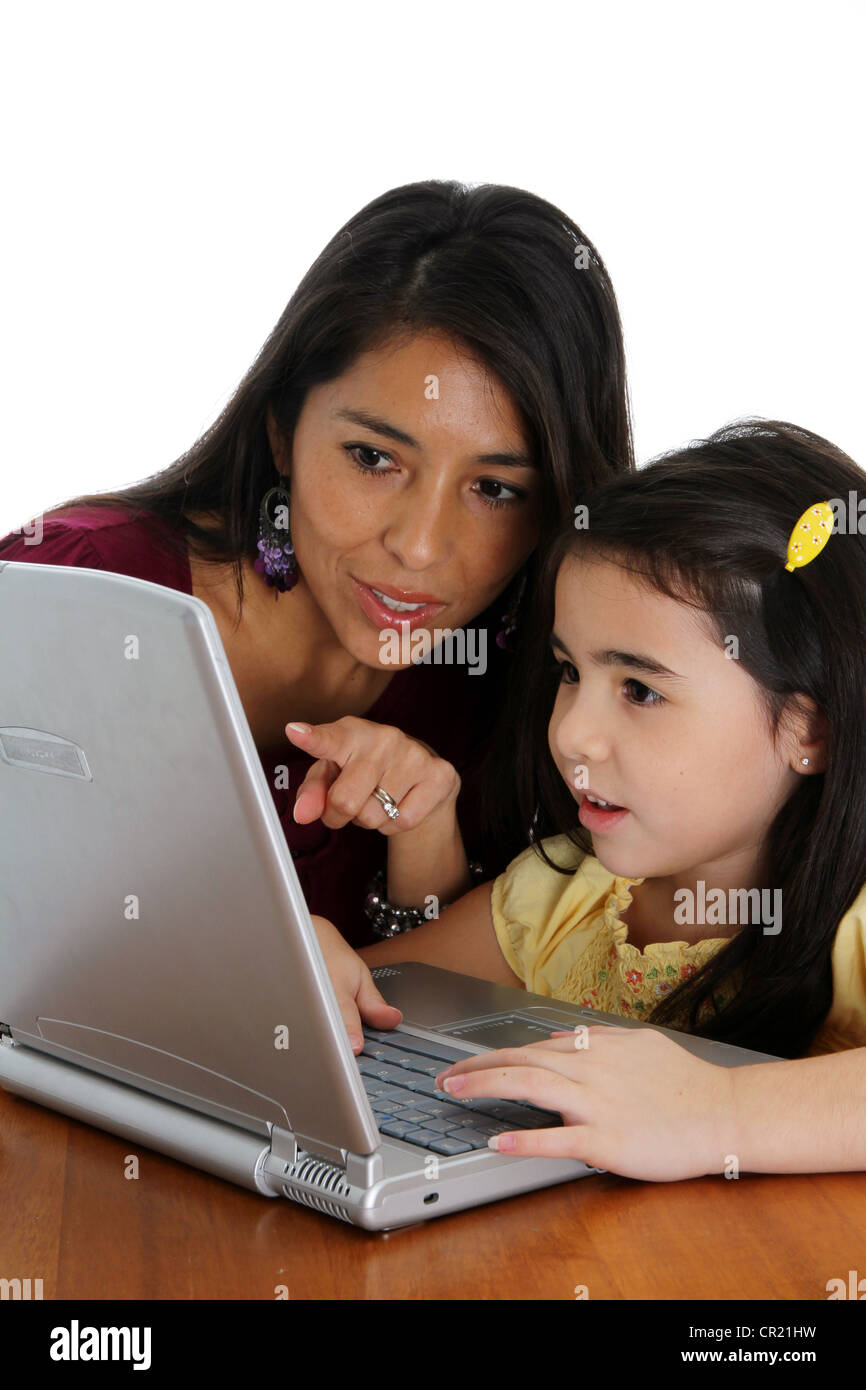 Mother and Daughter Working on Computer at Home Stock Photo - Alamy
