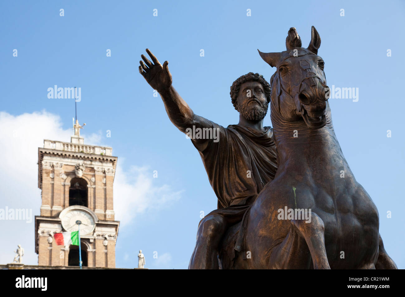 Ancient statues and clock tower Stock Photo - Alamy