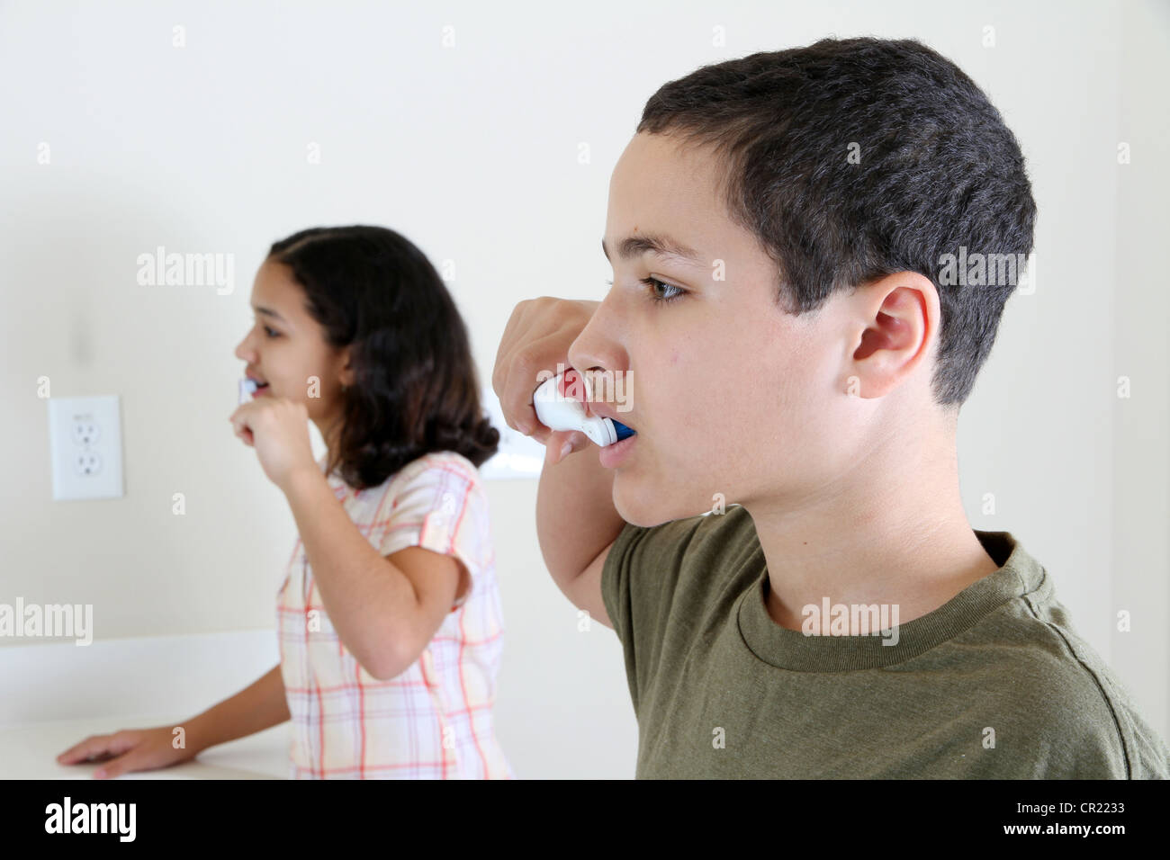 Teen boy brushing teeth hi-res stock photography and images - Alamy