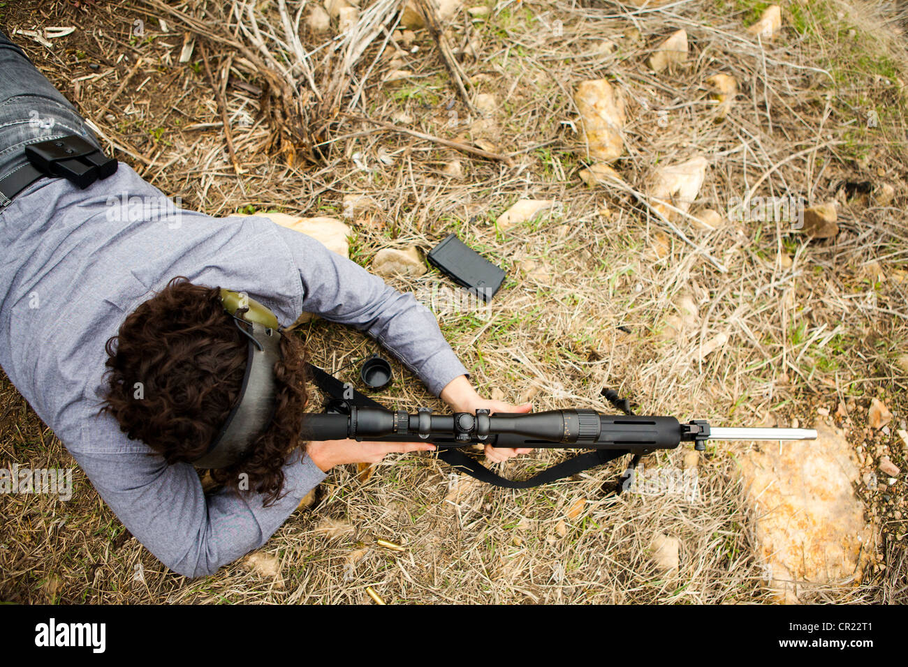 USA, Utah, Spanish Fork, Man lying on front with weapon Stock Photo - Alamy