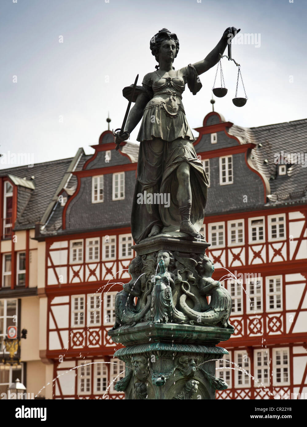 Ornate fountain with statue in square Stock Photo - Alamy