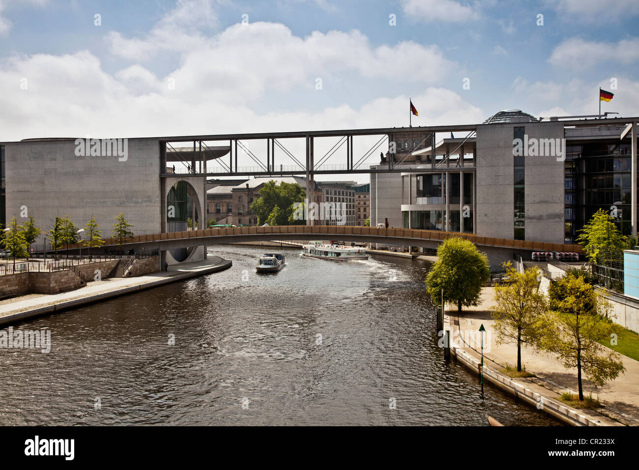 Pedestrian bridge over urban canal Stock Photo - Alamy