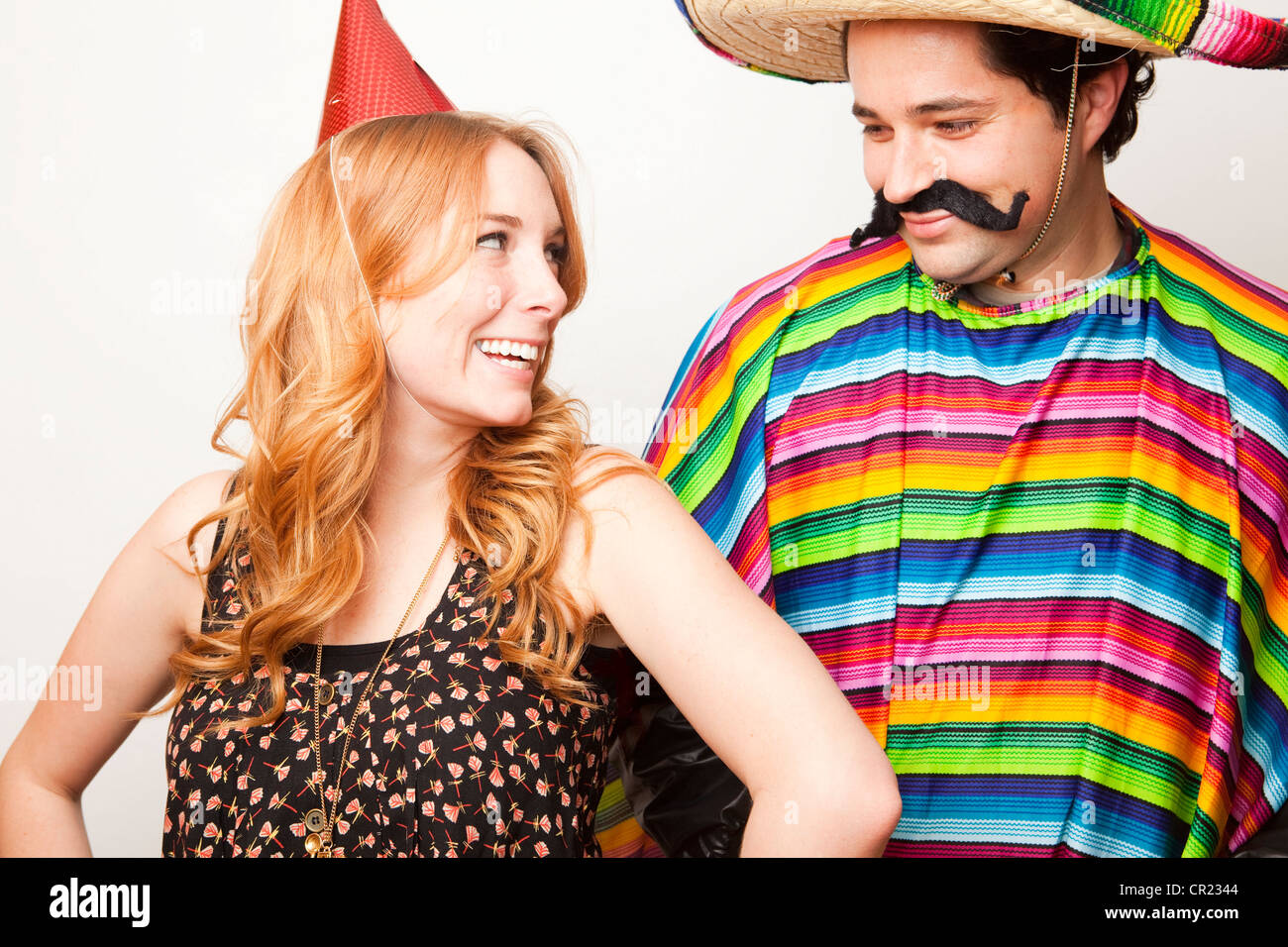Studio Shot of two people dressed up Stock Photo - Alamy