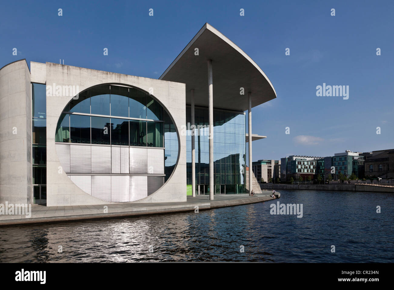 Modern building on urban canal Stock Photo - Alamy