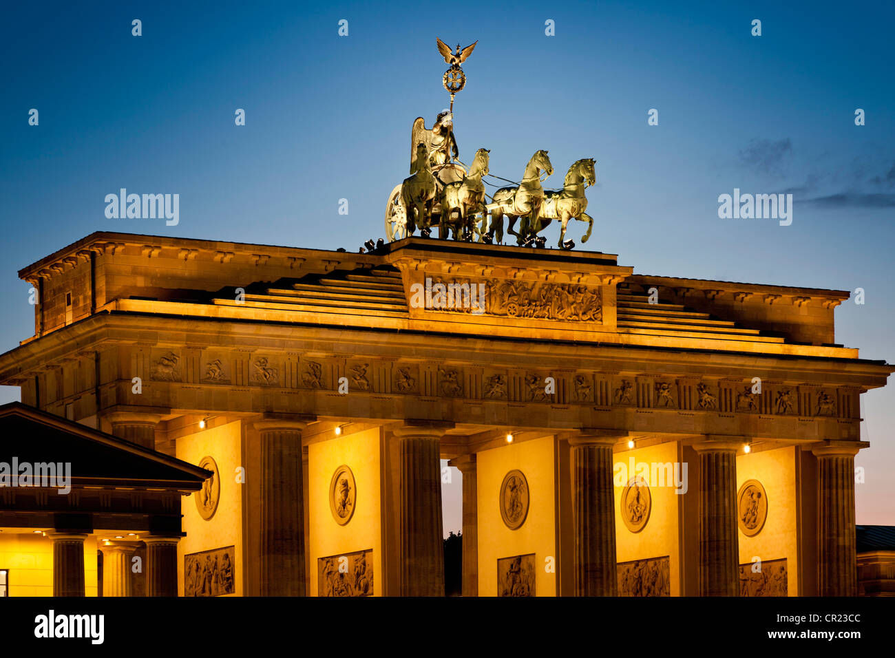 Ornate statues on columned building Stock Photo - Alamy