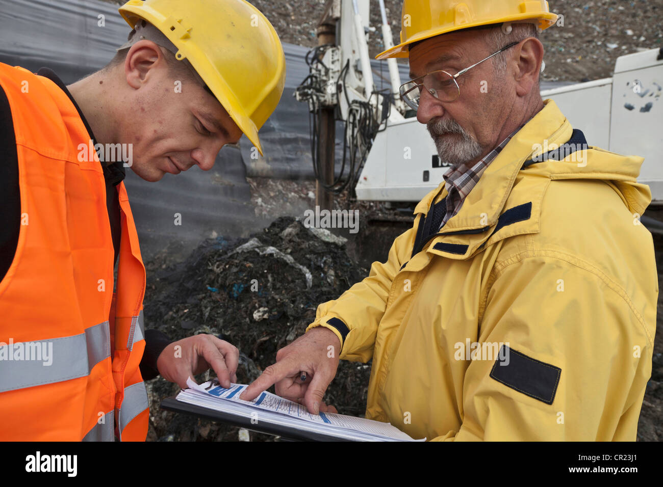 Workers at garbage collection center Stock Photo - Alamy