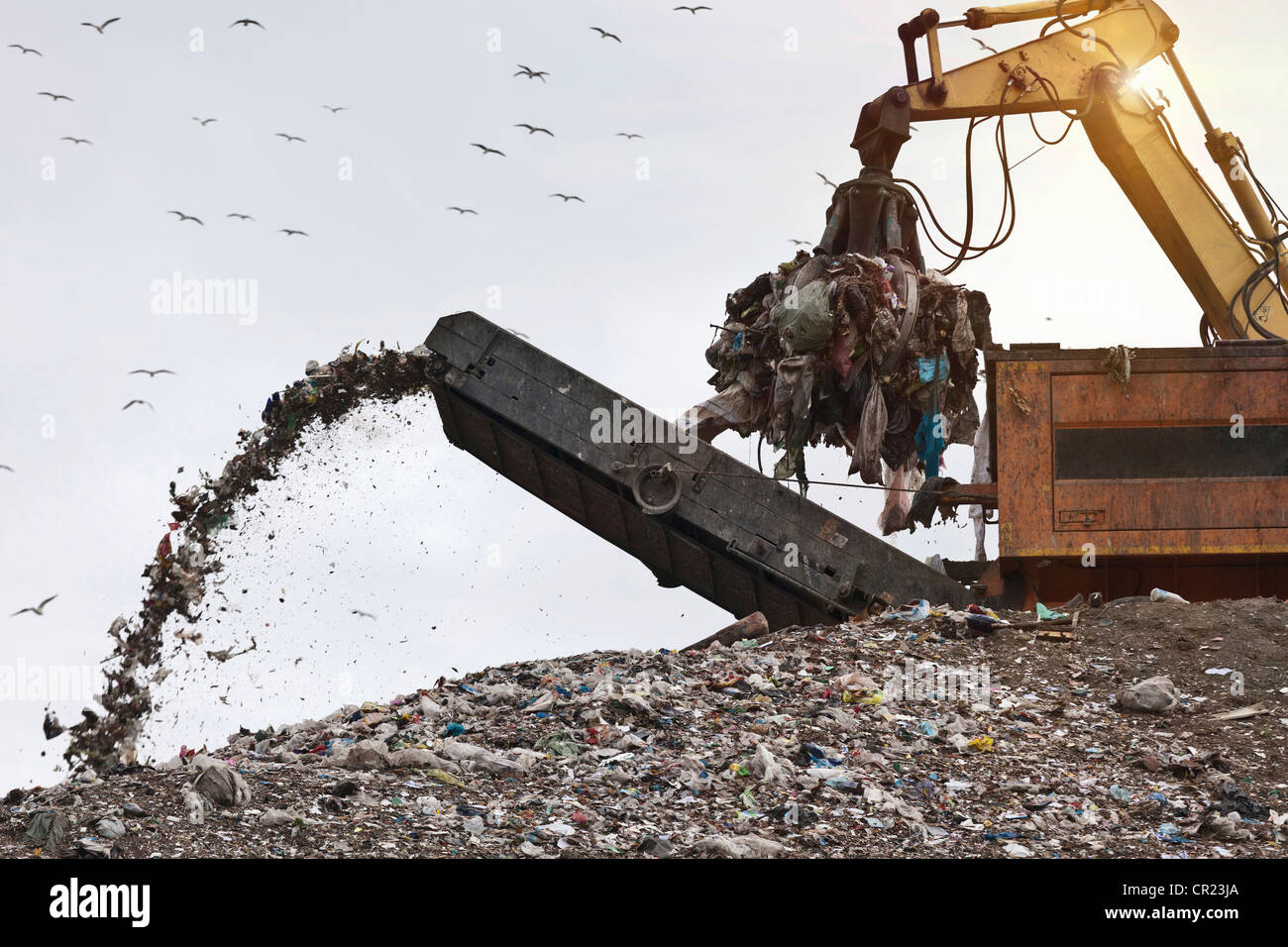 Crane at garbage collection center Stock Photo - Alamy