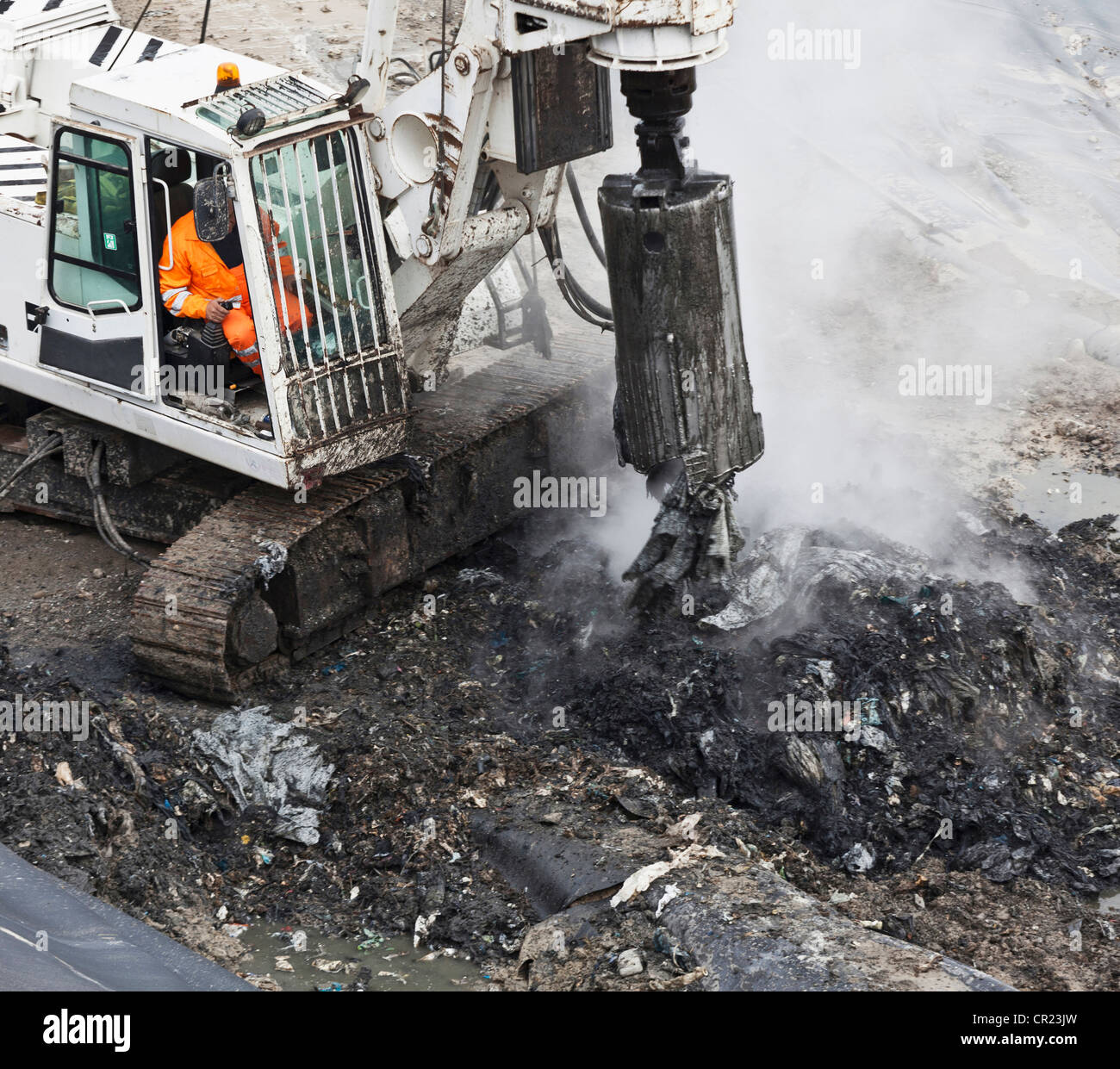Machinery at garbage collection center Stock Photo - Alamy