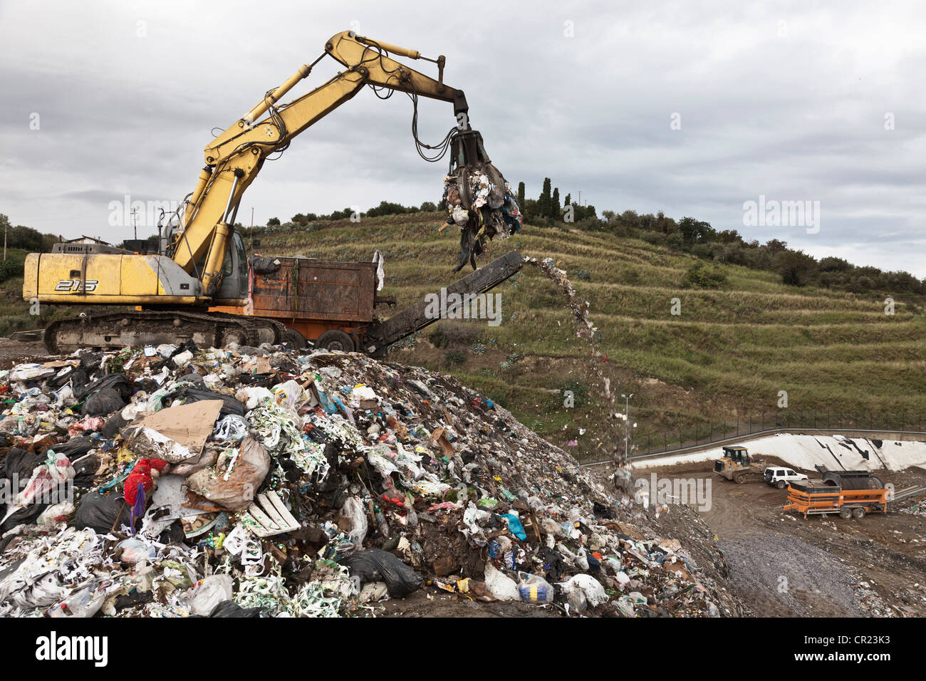 Crane at garbage collection center Stock Photo - Alamy