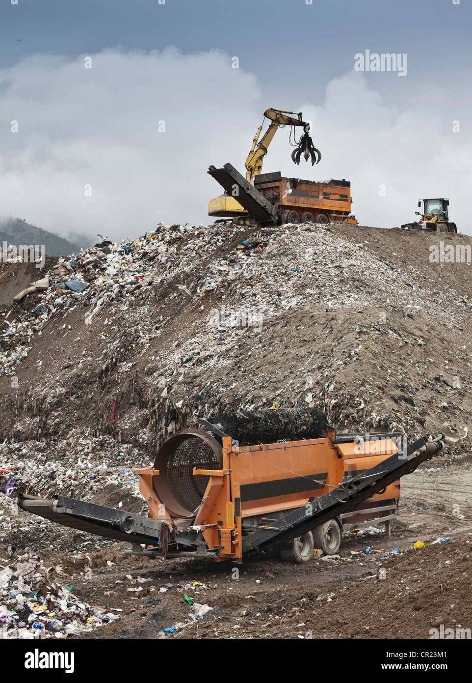 Machinery at garbage collection center Stock Photo - Alamy