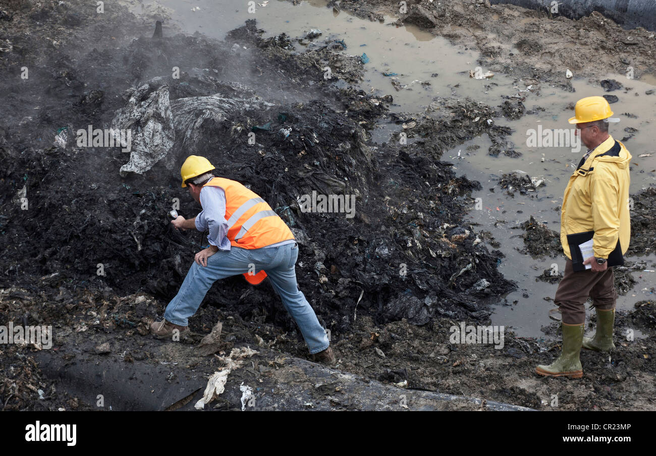 Workers at garbage collection center Stock Photo - Alamy