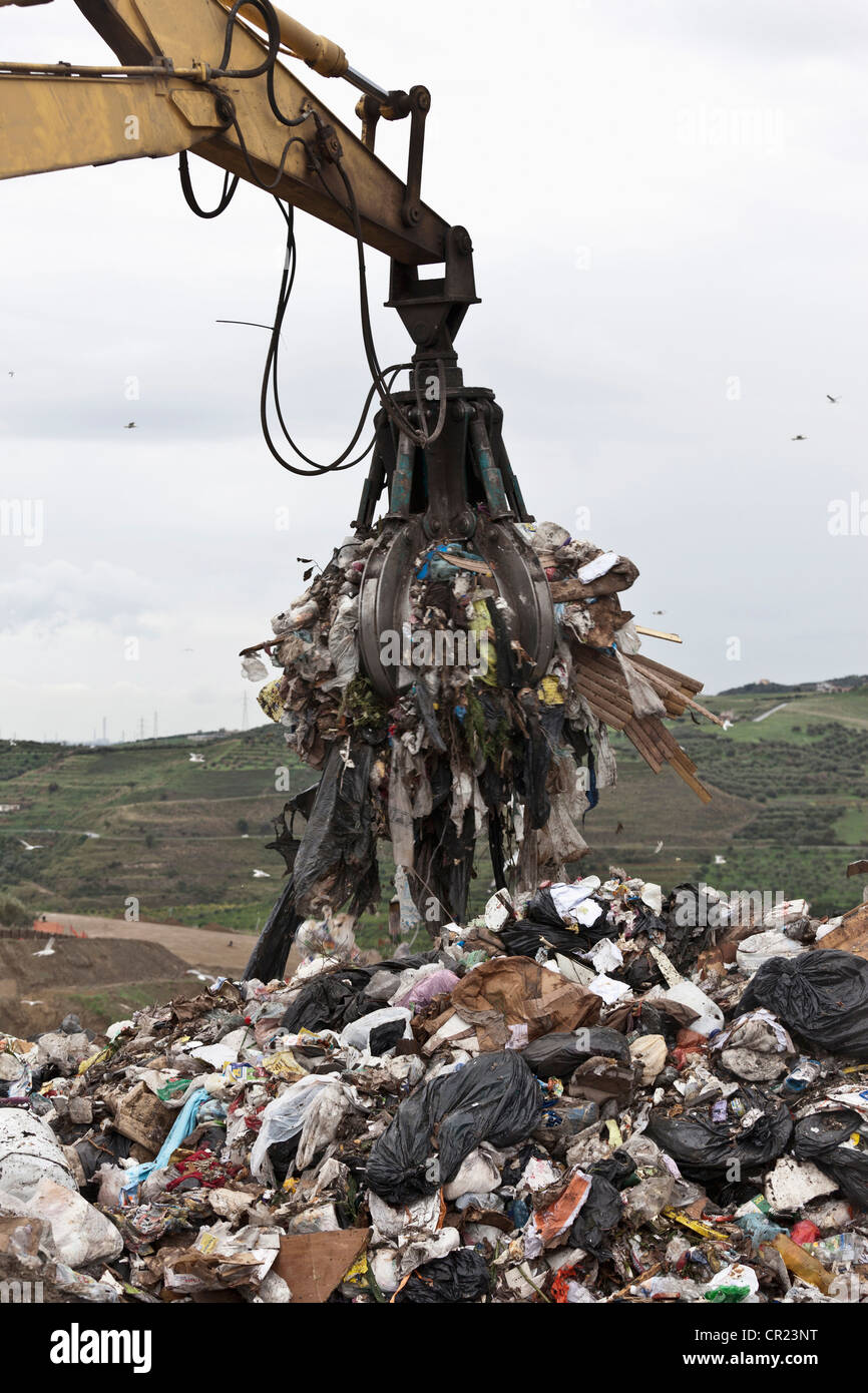 Crane at garbage collection center Stock Photo - Alamy