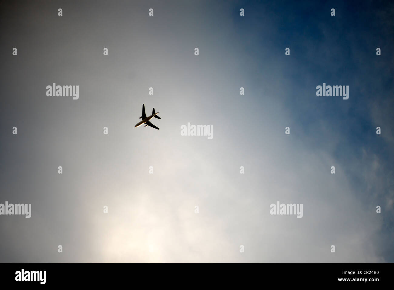 jet flying through sky Stock Photo - Alamy
