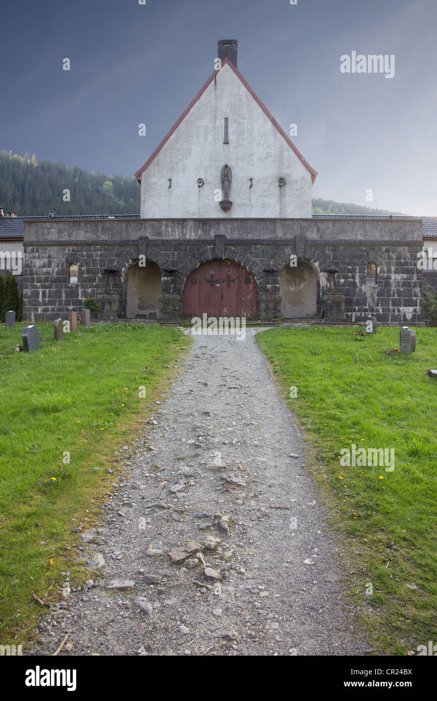 Picture of a graveyard buildning with a pathway leading to it Stock ...