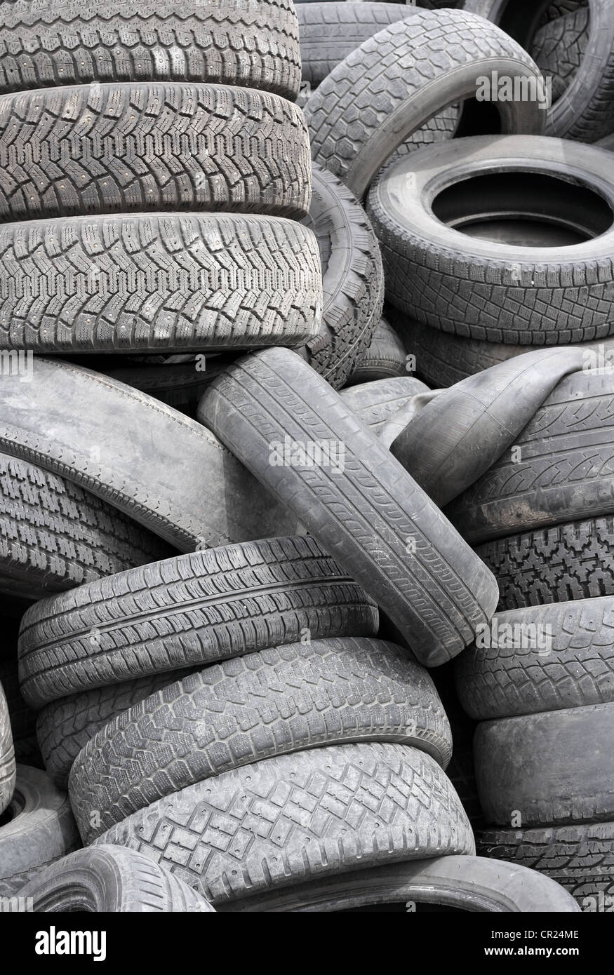 background with old tires on each other Stock Photo - Alamy