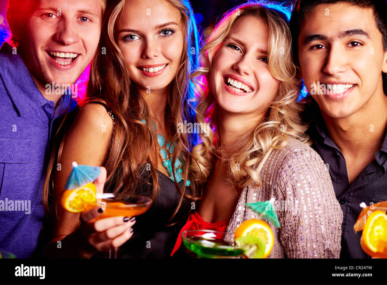 Group of cheerful friends having fun at party Stock Photo - Alamy
