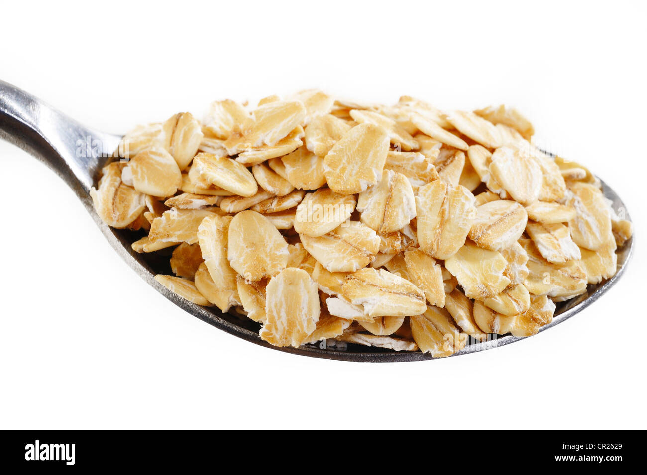 oat flakes in spoon Stock Photo - Alamy