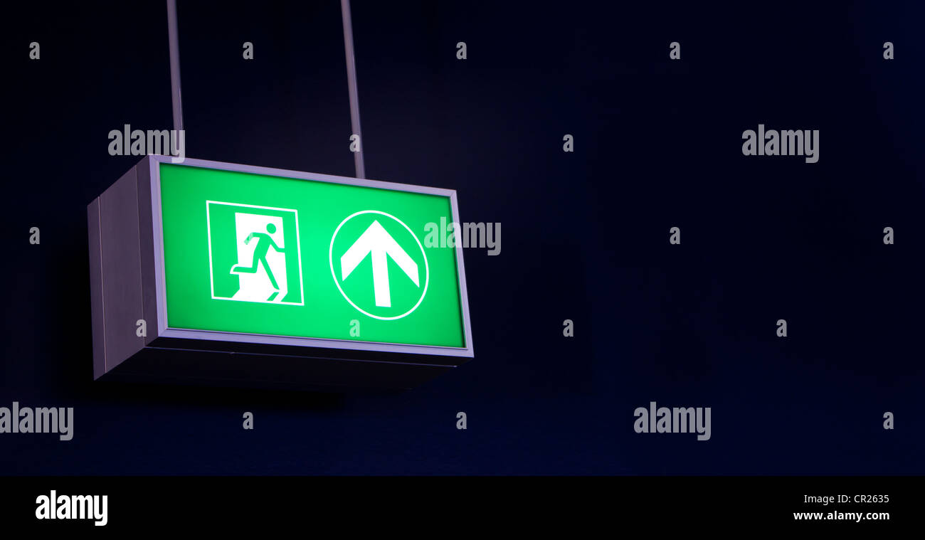 Emergency exit sign in modern offices inside an industrial plant Stock ...