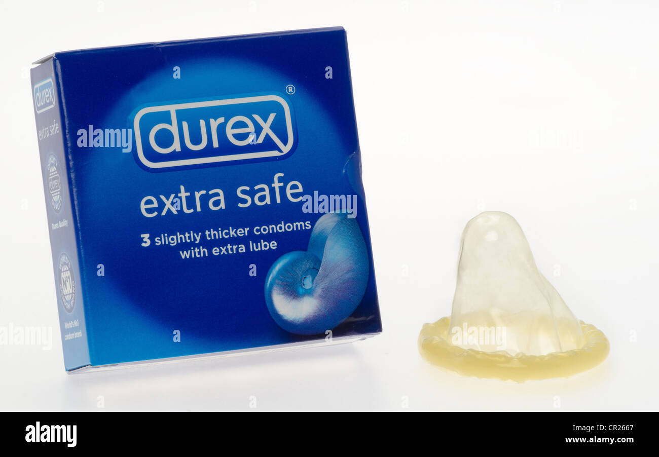 Durex condom box and single condom - studio shot with a white ...