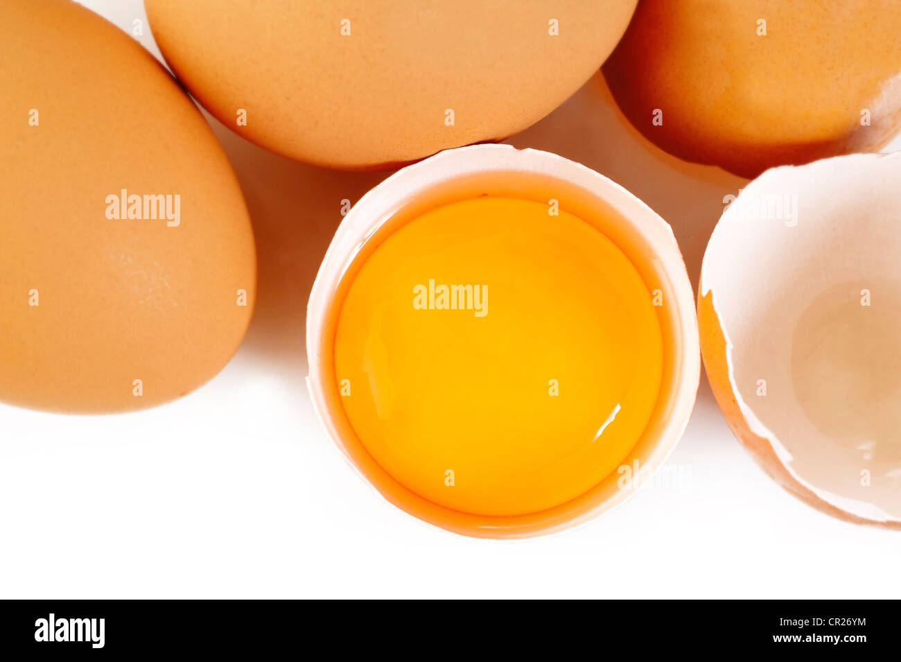 Broken egg isolated on white background Stock Photo - Alamy