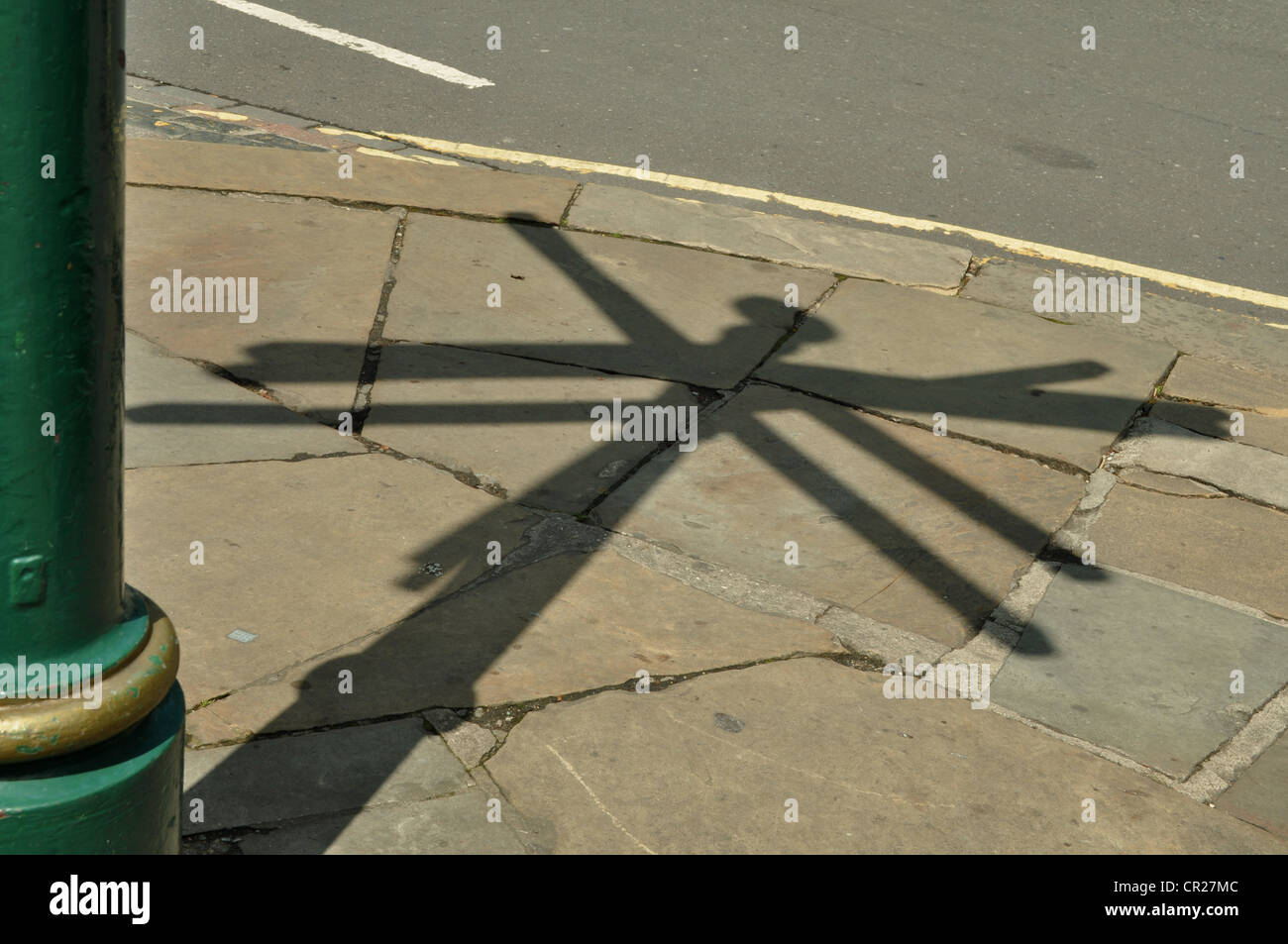 Shadow of street sign Stock Photo - Alamy