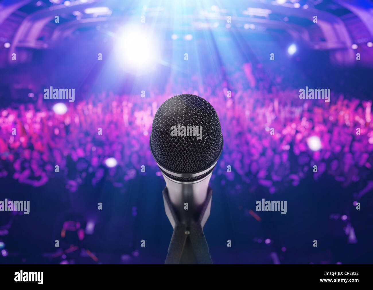 Mike with an audience on beautiful background Stock Photo - Alamy