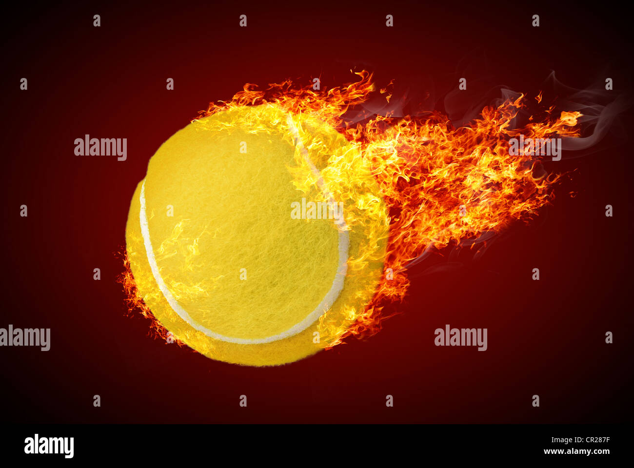 Flying tennis ball on fire Stock Photo - Alamy
