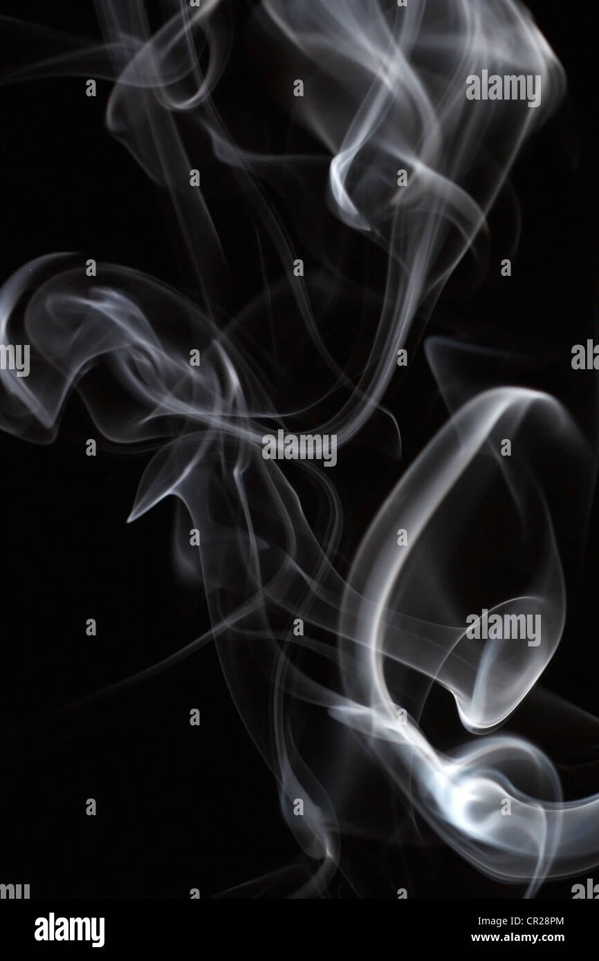 Abstract smoke curling and creating beautiful shapes Stock Photo - Alamy