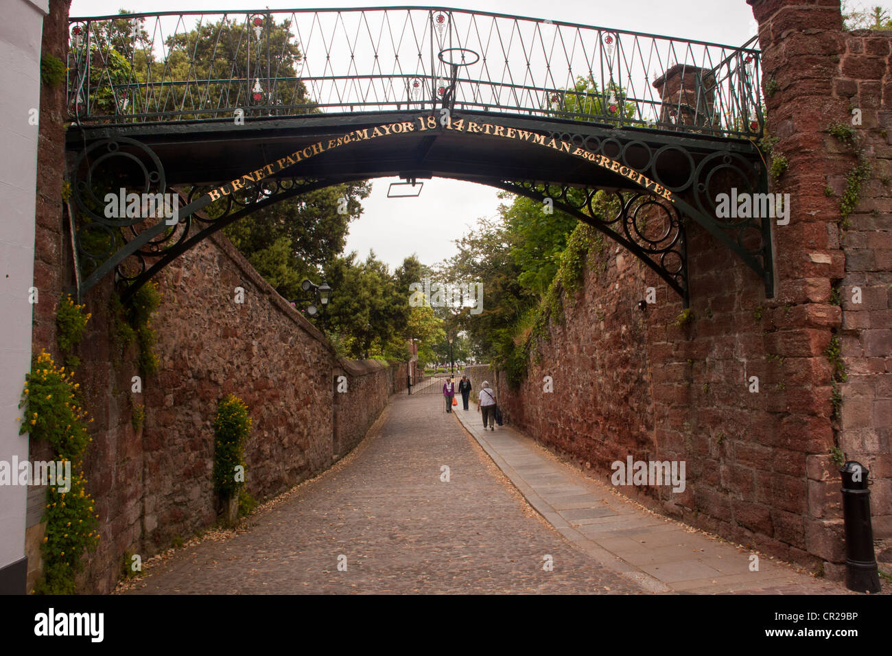 Wrought iron footbridge part of city wall in Exeter dates from 1814 ...