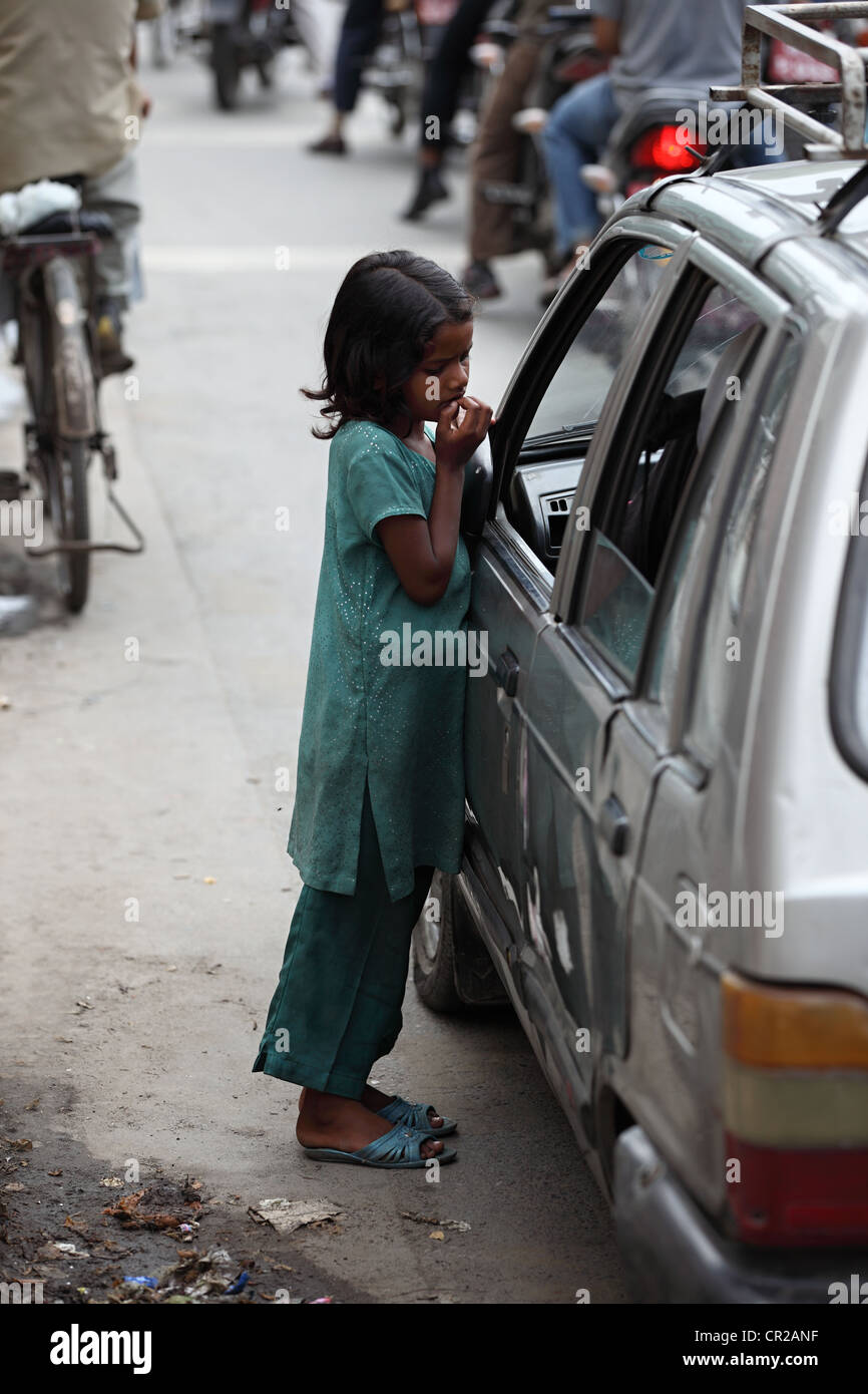 Homeless girl begging in the street of Kathmandu Nepal Stock Photo - Alamy