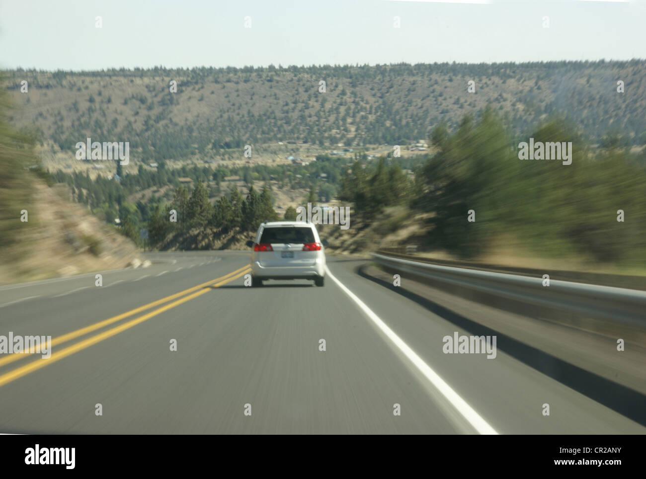 Traffic blur, white car, high desert, Central Oregon Stock Photo - Alamy