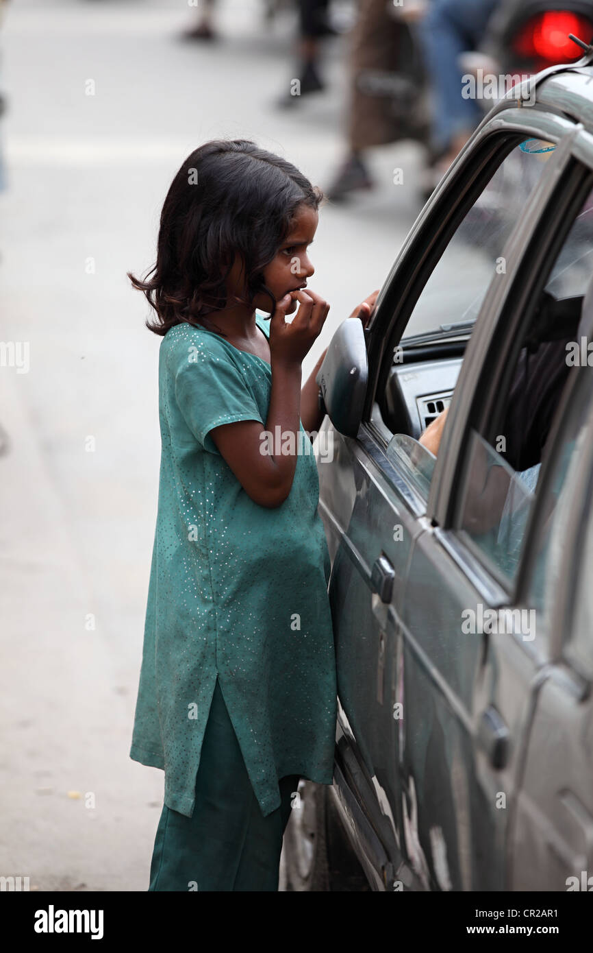 Homeless girl begging in the street of Kathmandu Nepal Stock Photo - Alamy