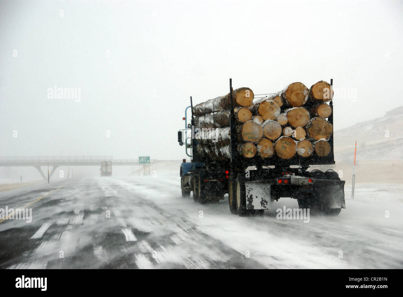 Logging truck on road hi-res stock photography and images - Alamy