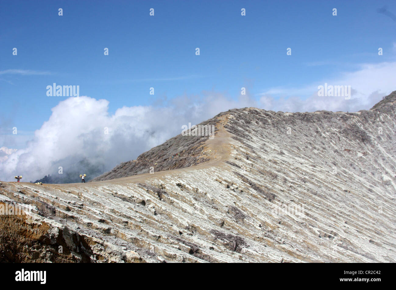 Sulphur Miners on the Crater Rim of Ijen Volcano in Indonesia Stock ...