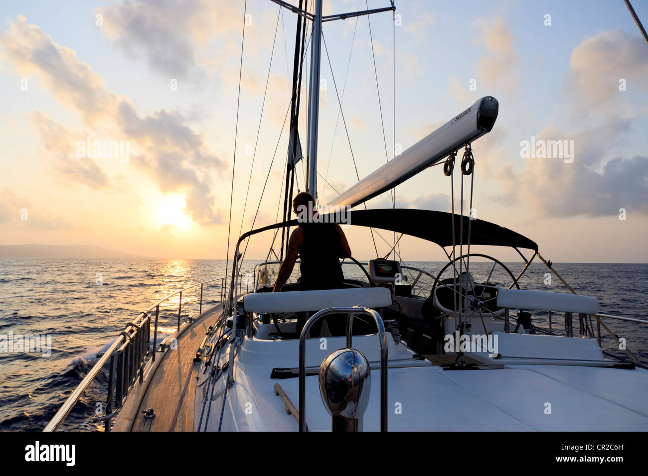 Sailing towards the sunset Stock Photo - Alamy