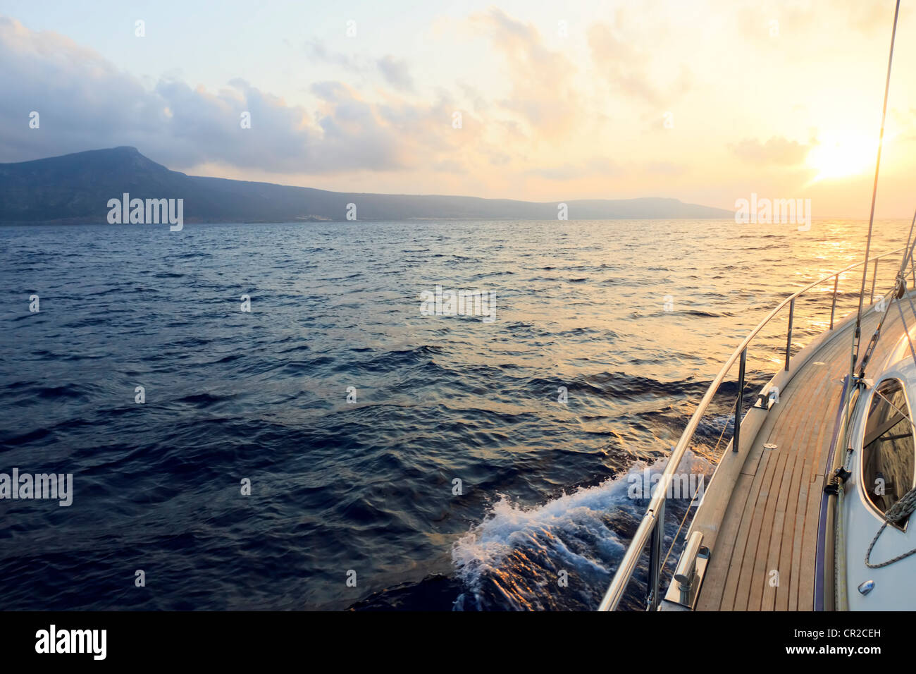 Sailing towards the sunset Stock Photo - Alamy