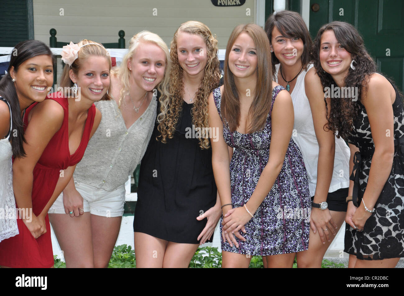 Seven girl friends going out together. Taking a picture in the ...