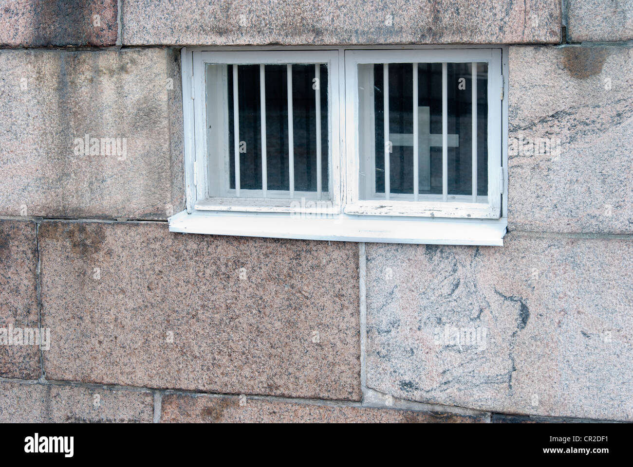 A cross behind window bars in Helsinki Finland Stock Photo - Alamy