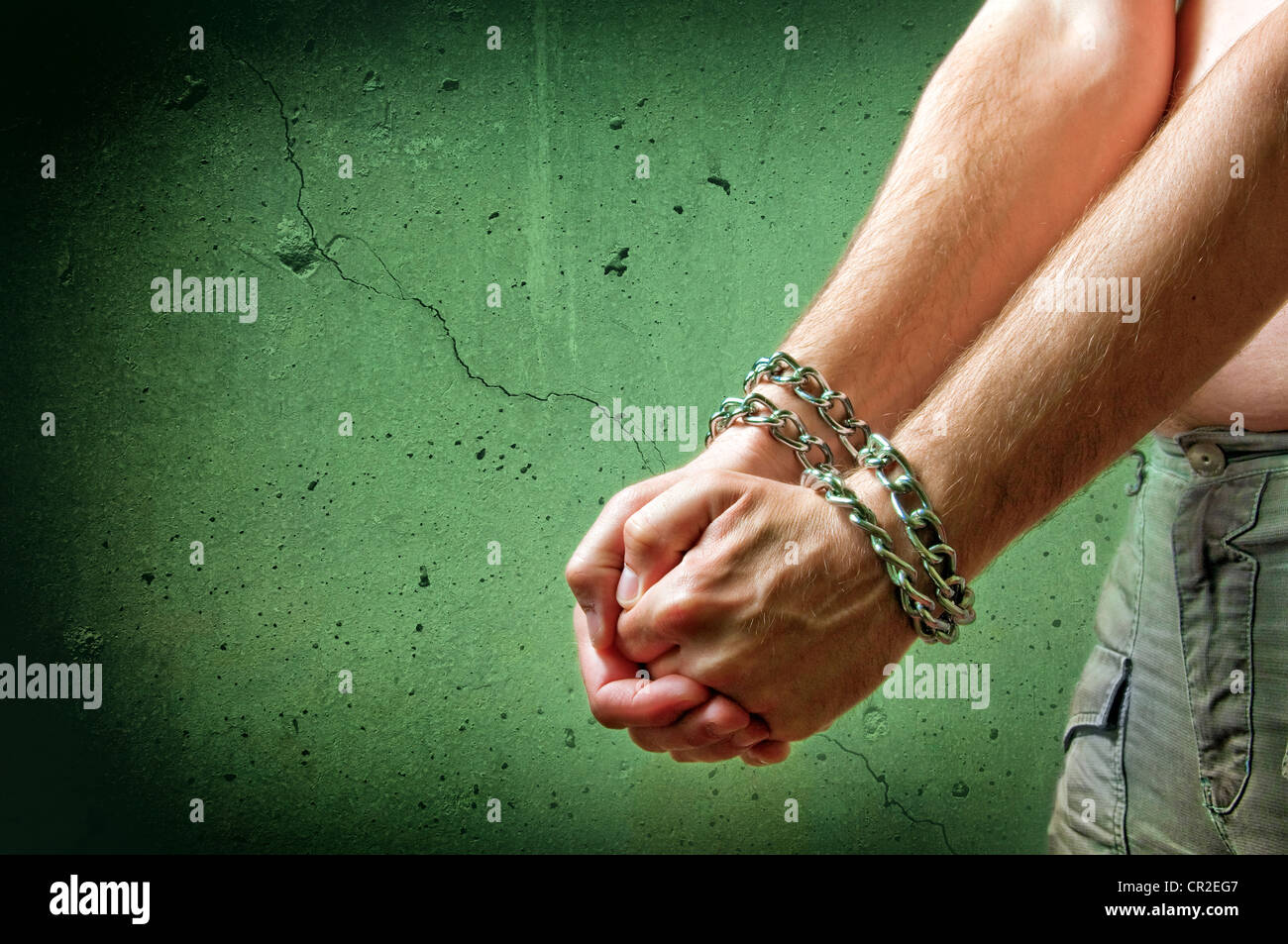 Male hands with chain wrapped around them, prisoner concept Stock Photo ...